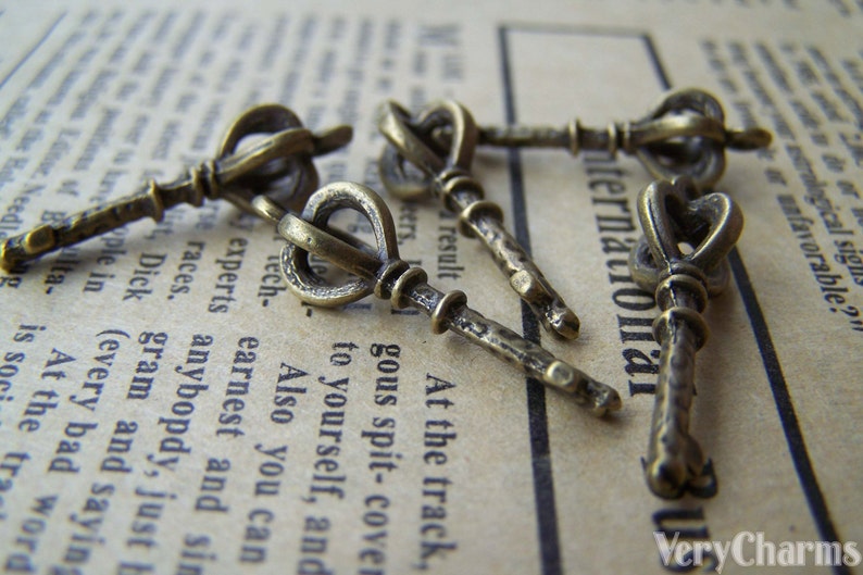 20 Pcs of Antique Bronze Crown Skeleton Key Charms 8x23mm A186 - Etsy