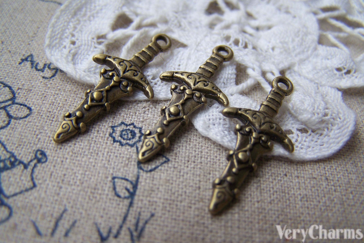 20 Pcs of Antique Bronze Lovely Sword Charms 13x28mm A2190 | Etsy