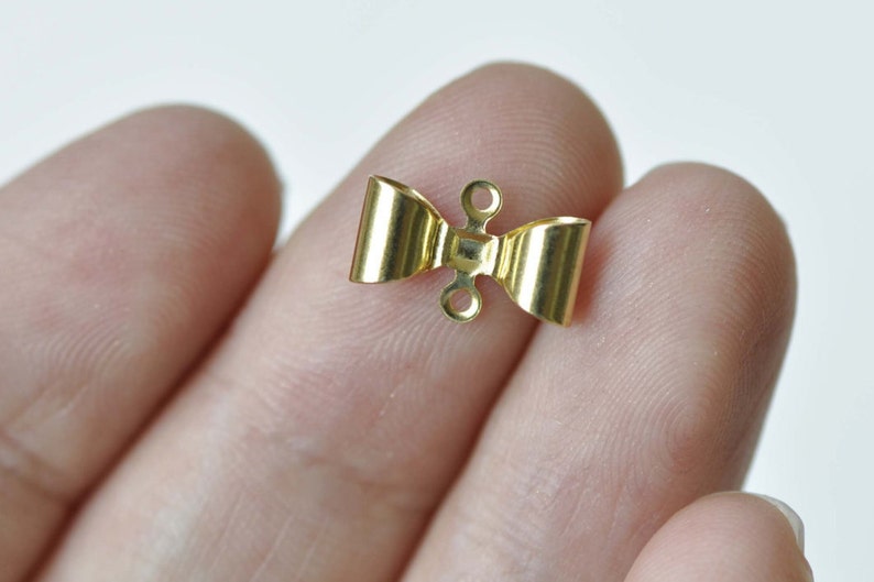 20 Pcs of Raw Brass Bow Tie Knot Connectors 7x12mm A8569 - Etsy