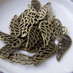 20 Pcs of Antique Bronze Filigree Wing Charms 9x23mm A1579 - Etsy