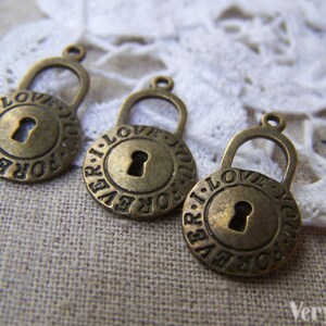 10 Pcs of Antique Bronze Round Lock Charms 13x21mm A2787 - Etsy