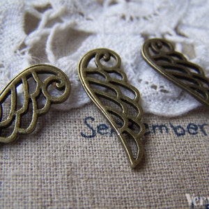 20 Pcs of Antique Bronze Filigree Wing Charms 9x23mm A1579 - Etsy
