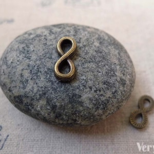 50 Pcs of Antique Bronze Figure 8 Connector Charms 5.5x12.5mm A6220 - Etsy