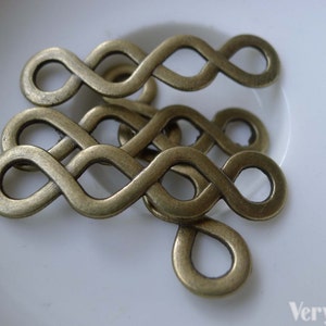 10 Pcs of Antique Bronze Figure 8 Connector Charms 10x44mm A7751 - Etsy