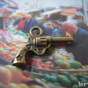 20 Pcs of Antique Bronze Mini Pistol Gun Charms 11x22mm A4262 - Etsy