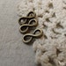 50 Pcs of Antique Bronze Figure 8 Connector Charms 5.5x12.5mm A6220 - Etsy