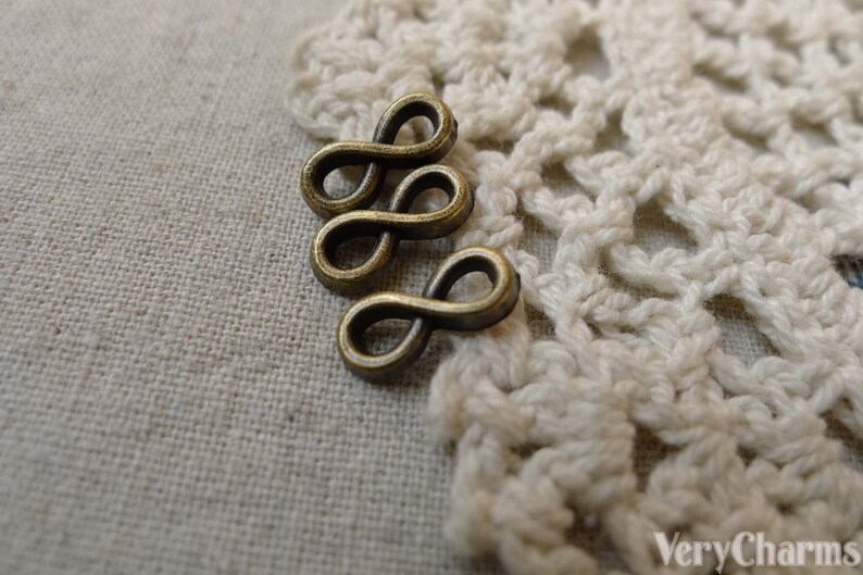 50 Pcs of Antique Bronze Figure 8 Connector Charms 5.5x12.5mm A6220 - Etsy