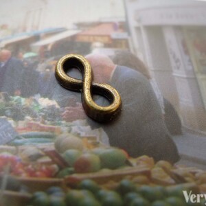 50 Pcs of Antique Bronze Figure 8 Connector Charms 5.5x12.5mm A6220 - Etsy