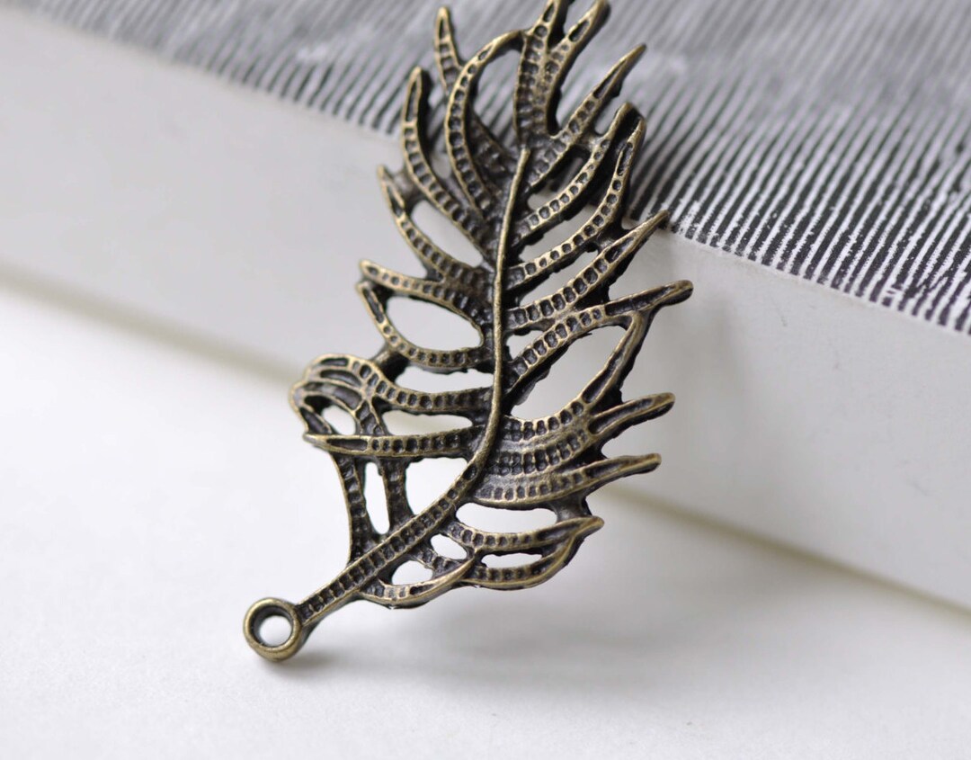 10 Pcs of Antique Bronze Filigree Feather Charms 19x37mm A7737 - Etsy