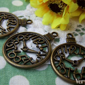 10 Pcs of Antique Bronze Filigree Clock Pendants Charms 30x39mm A476 - Etsy