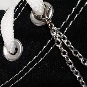 Silver Skull With Ornate Cross and Spike Charms With Swooping Chain ...