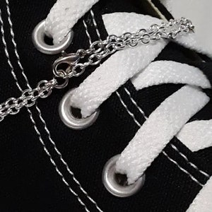 Silver Skull With Ornate Cross and Spike Charms With Swooping Chain ...