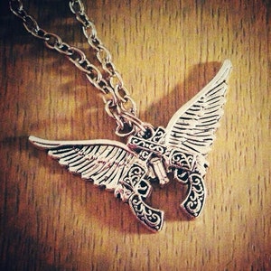 Gun With Wings Necklace Crossed Pistols Necklace Winged Guns Necklace ...
