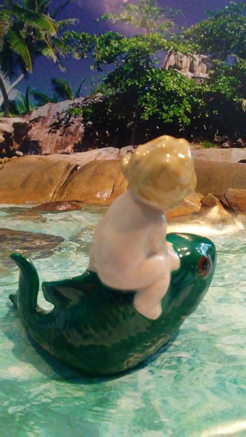 Baby Riding on a Green Fish - Etsy
