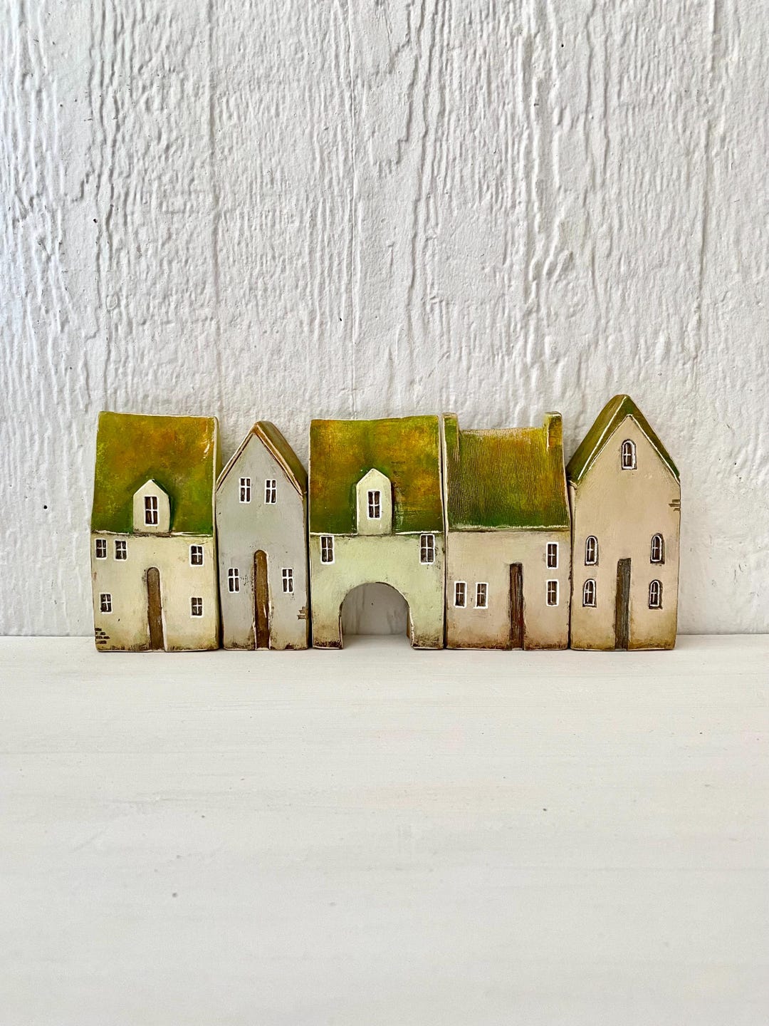 A Set of Five Miniature Rustic Pastel Colors Painted Houses With Green ...