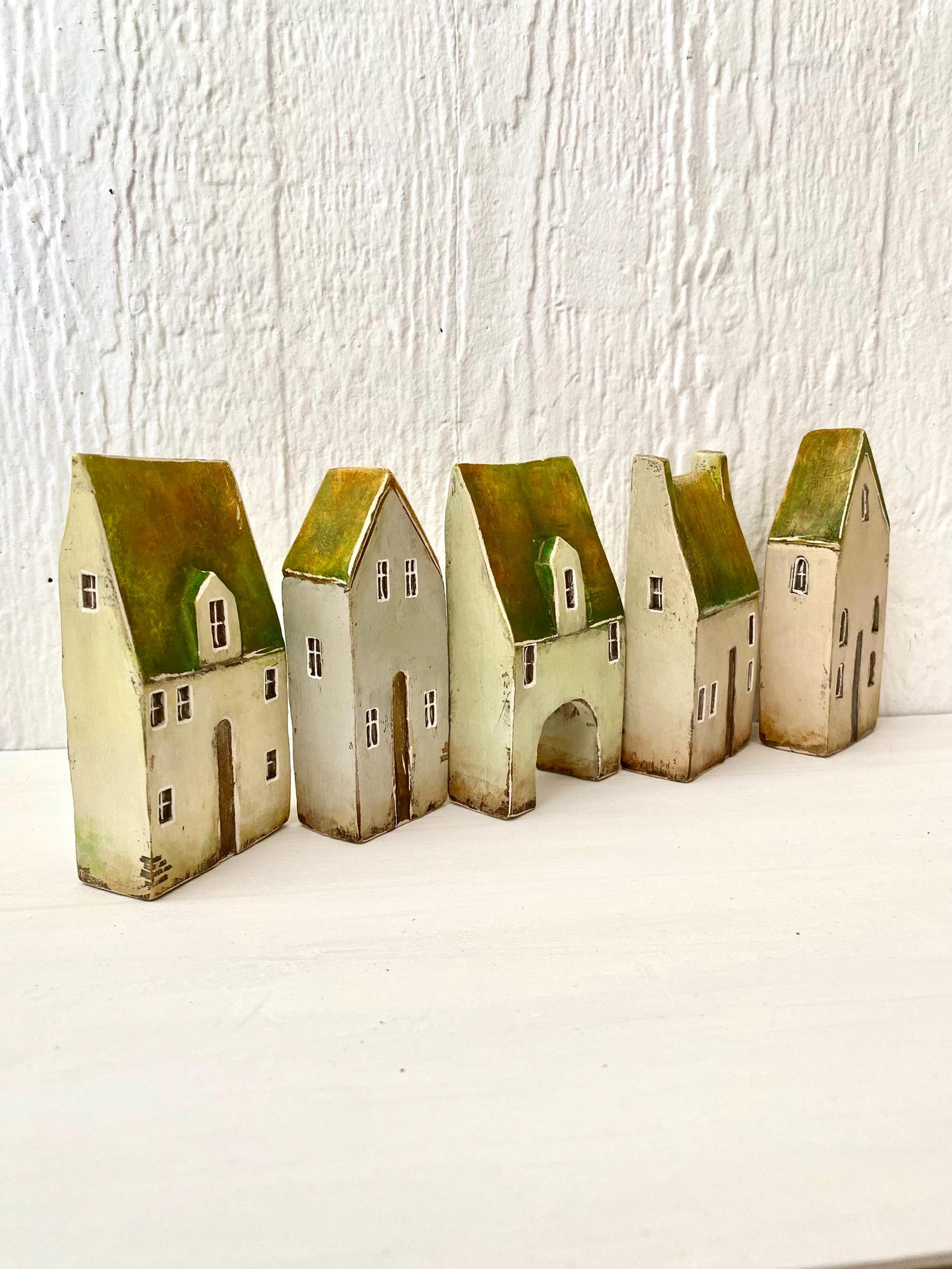 A Set of Five Miniature Rustic Pastel Colors Painted Houses With Green ...