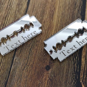 A Pair of Laser Cut Acrylic Razor Blade Charms in a Mirrored Finish ...
