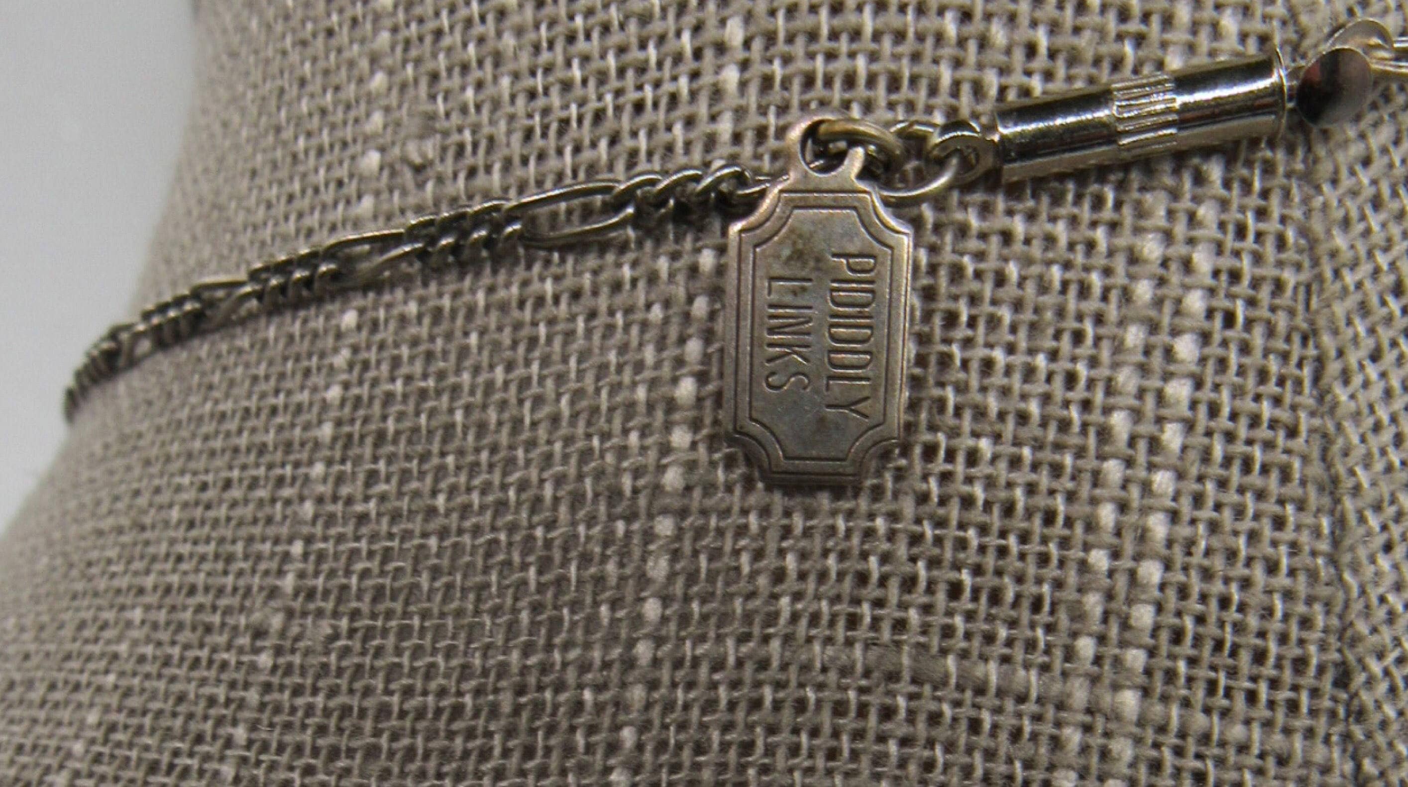 Pididdly Links Kingston NY silver tone fairy rhinestone signed pendant ...