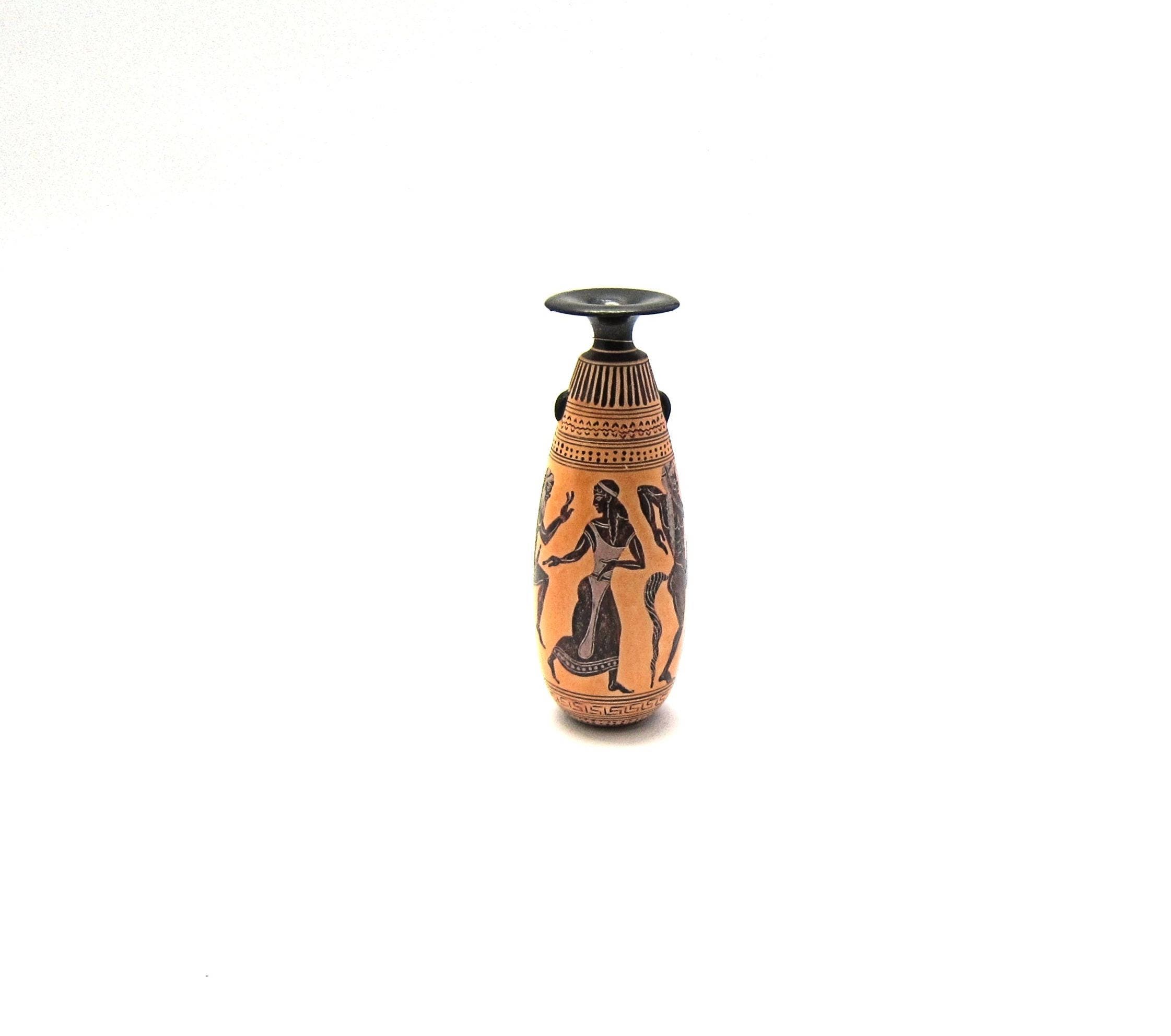 Greek Vase , Black Figure Alabastron of a Satyr Pursuing a Maenad , the ...