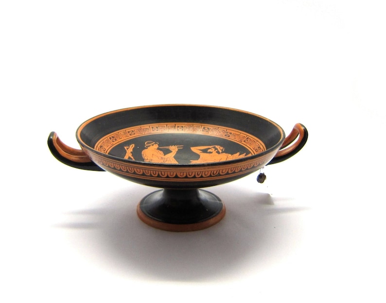 Kylix , Greek Vase , Attic Red Figured Kylix of Dionysus Resting Under ...