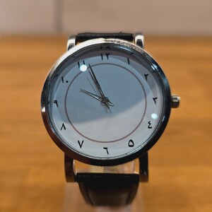 Arabic Number Design Watch. Shows Arabic Numerals in a Clean Classy ...