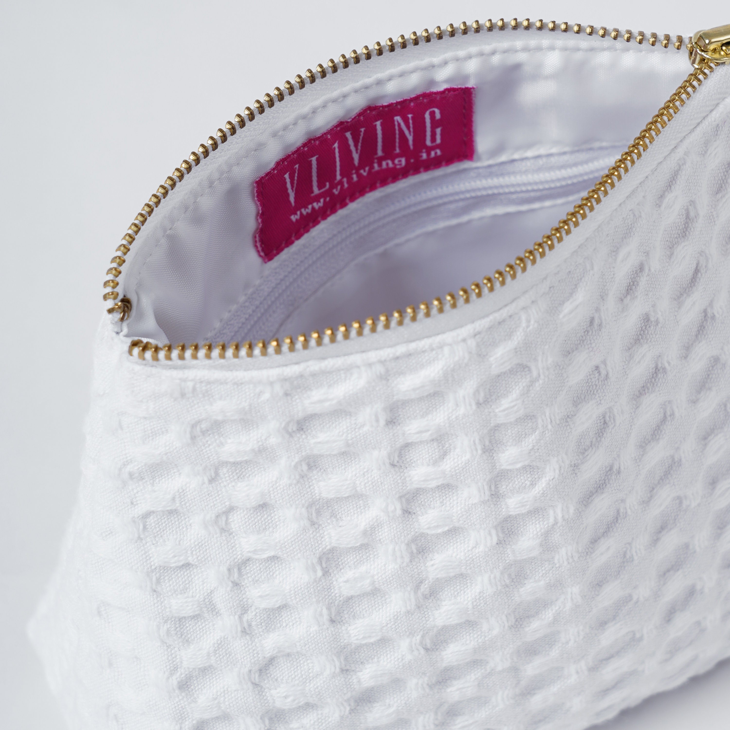 A Pair of White Waffle Nesting Pouches With Zipper Closure and Tassel ...