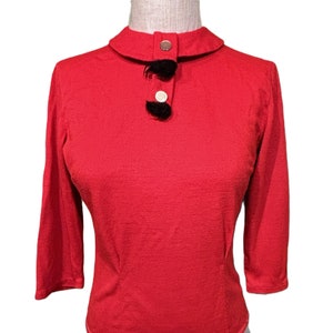 red button back sweater