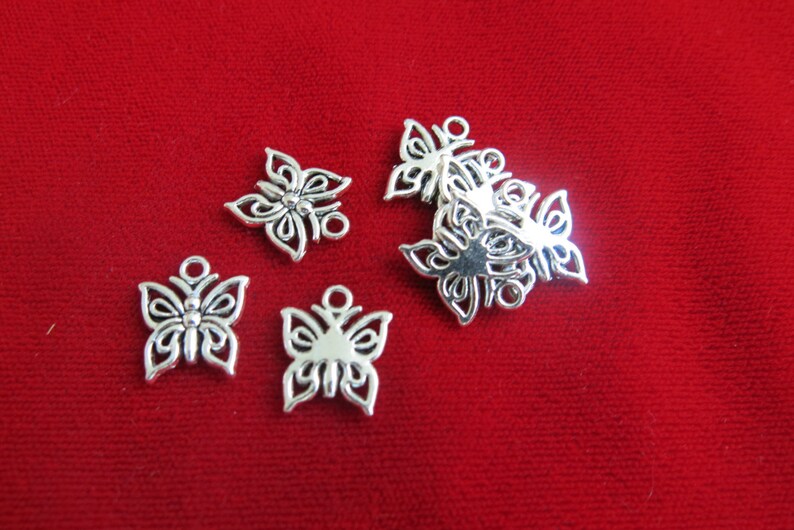 10pc butterfly Charms in Antique Silver - Etsy