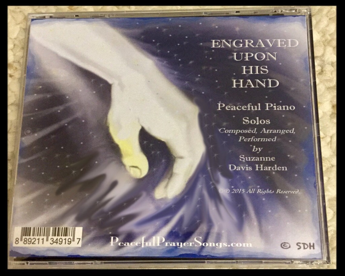 Music Cd-engraved Upon His Hand Peaceful Piano Solos by Suzanne Davis ...