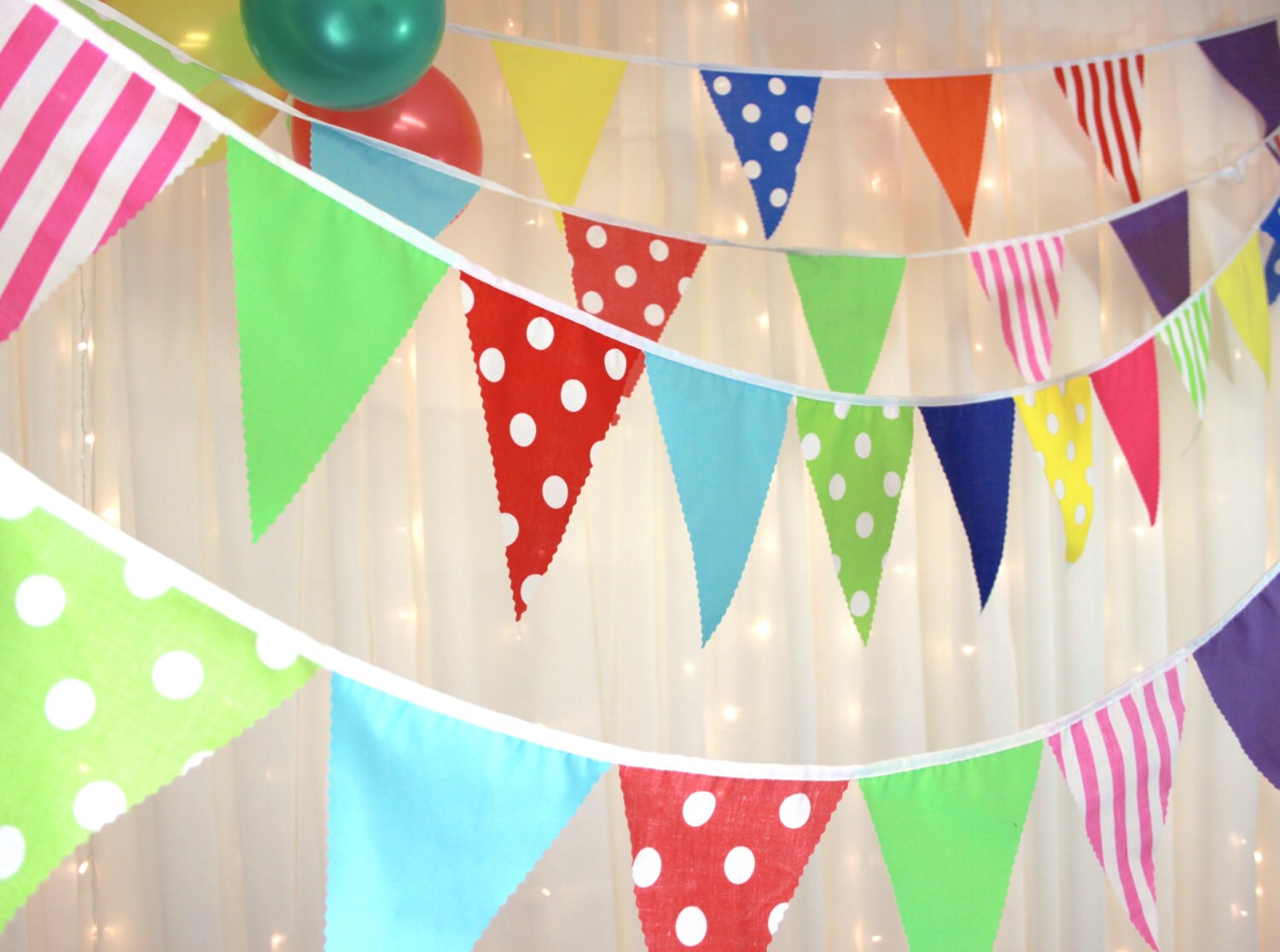 Vibrant multi coloured party bunting with spots stripes