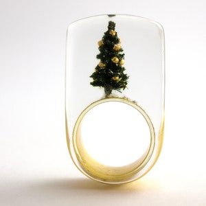 Merry Christmas Sparkling Ring With a Decorated Christmas Tree Made of ...