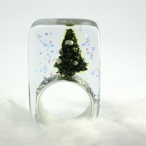 Merry Christmas Sparkling Ring With a Decorated Christmas Tree Made of ...
