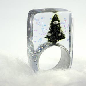 Merry Christmas Sparkling Ring With a Decorated Christmas Tree Made of ...