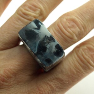 Zombie Creepy Undead Ring With Three Black Hands and Fog on a Black ...