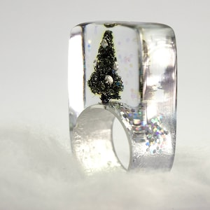 Merry Christmas Sparkling Ring With a Decorated Christmas Tree Made of ...