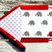 Paper Punched Gray and Red Elephants on a White Note Card With a ...