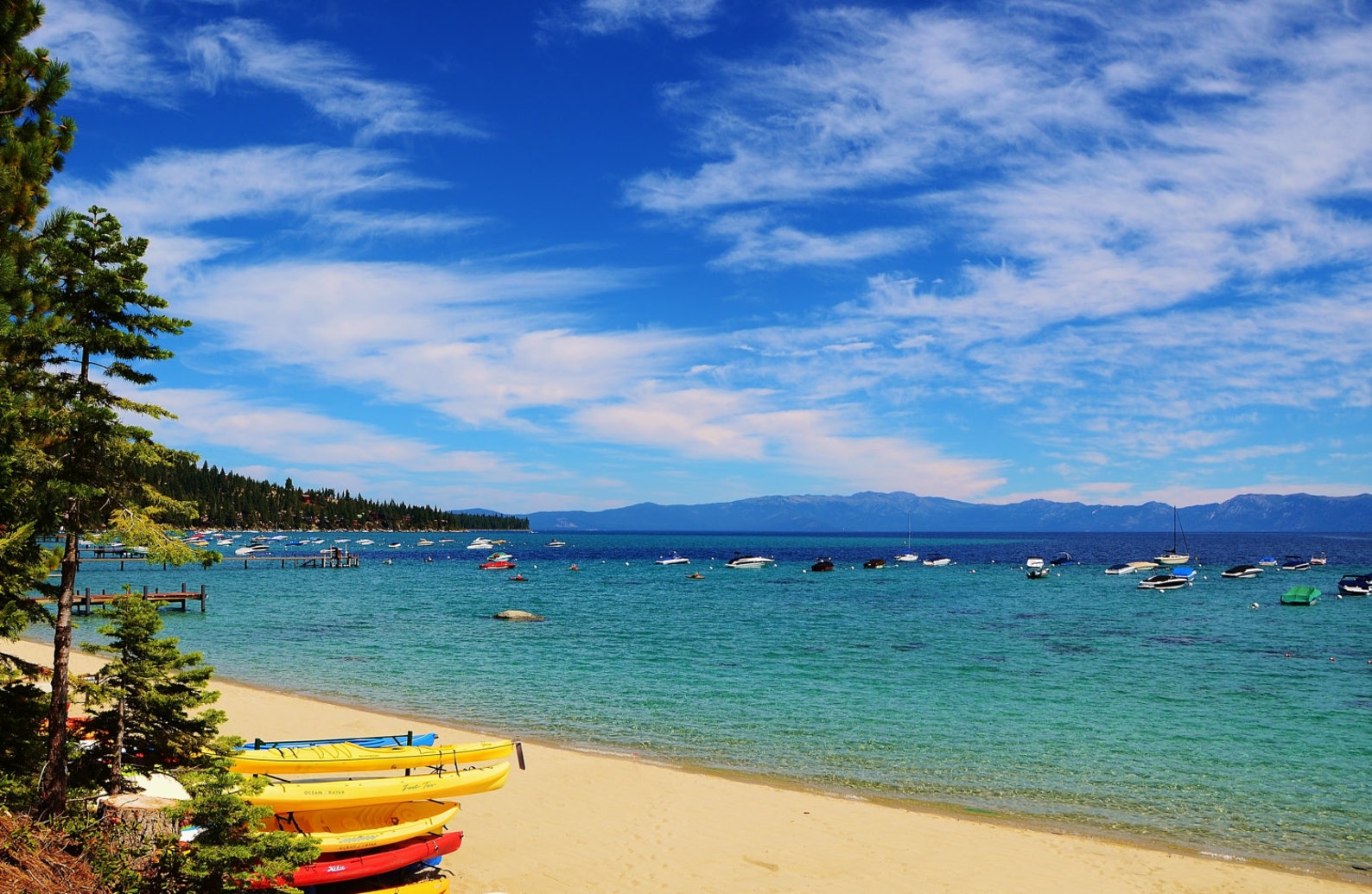 Color Photo of Blue Lake Tahoe With Colorful Kayaks on the Beach ...