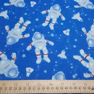 Flannel Fabric - Floating Astronauts on Blue - by the Yard - 100% ...