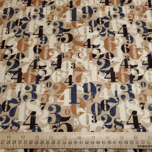 Premium Flannel Fabric - on Time Tan Numerals Premium Flannel - by the ...