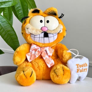 Vintage 1981 Dakin Garfield Tooth Fairy Pooky Bear Bow Tie Orange Plush ...