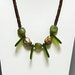 SPRITE: Necklace of Earthy Greens and Wood Hues; Simple yet Eye ...