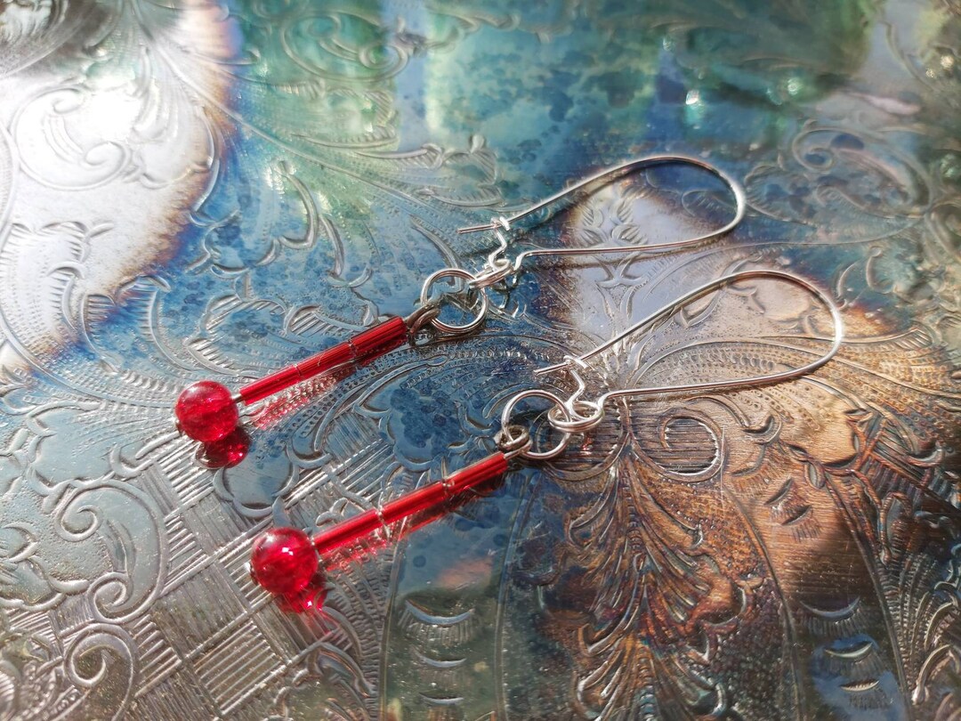 Blood Drop Earrings. Red Beads Hung on Wires That Fit Through Both ...