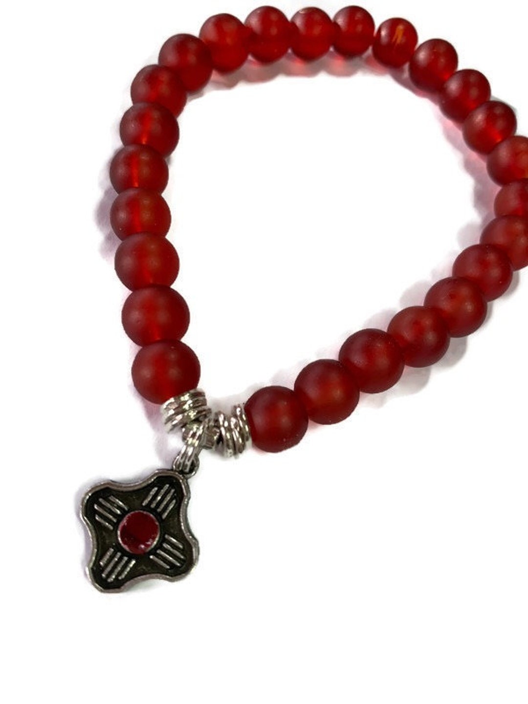 New Mexico Red Zia Symbol Glass Stretch Bracelet, UNM Licensed Charm ...