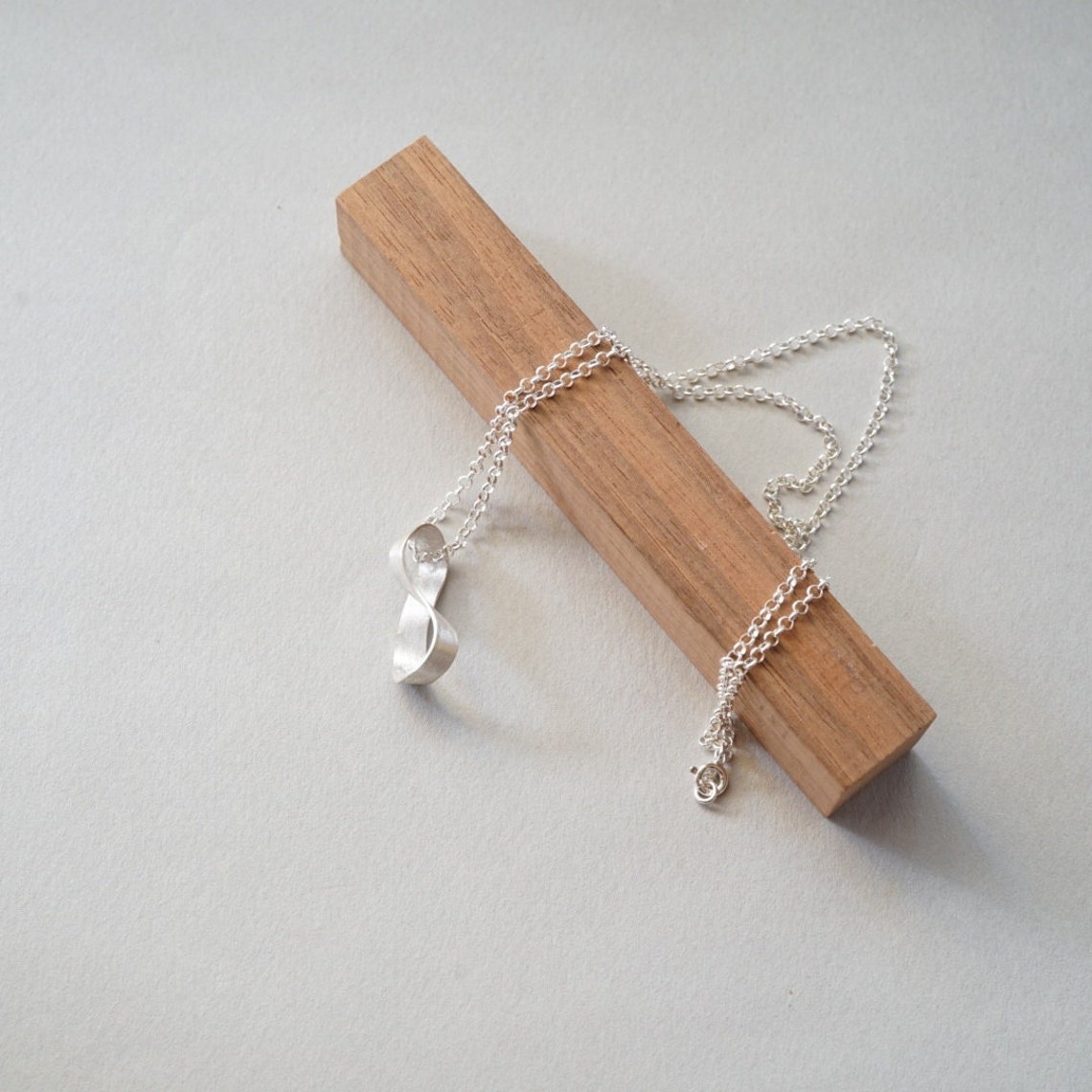 Small Mobius Strip Pendant, Laser Engraved Silver Necklace - Etsy