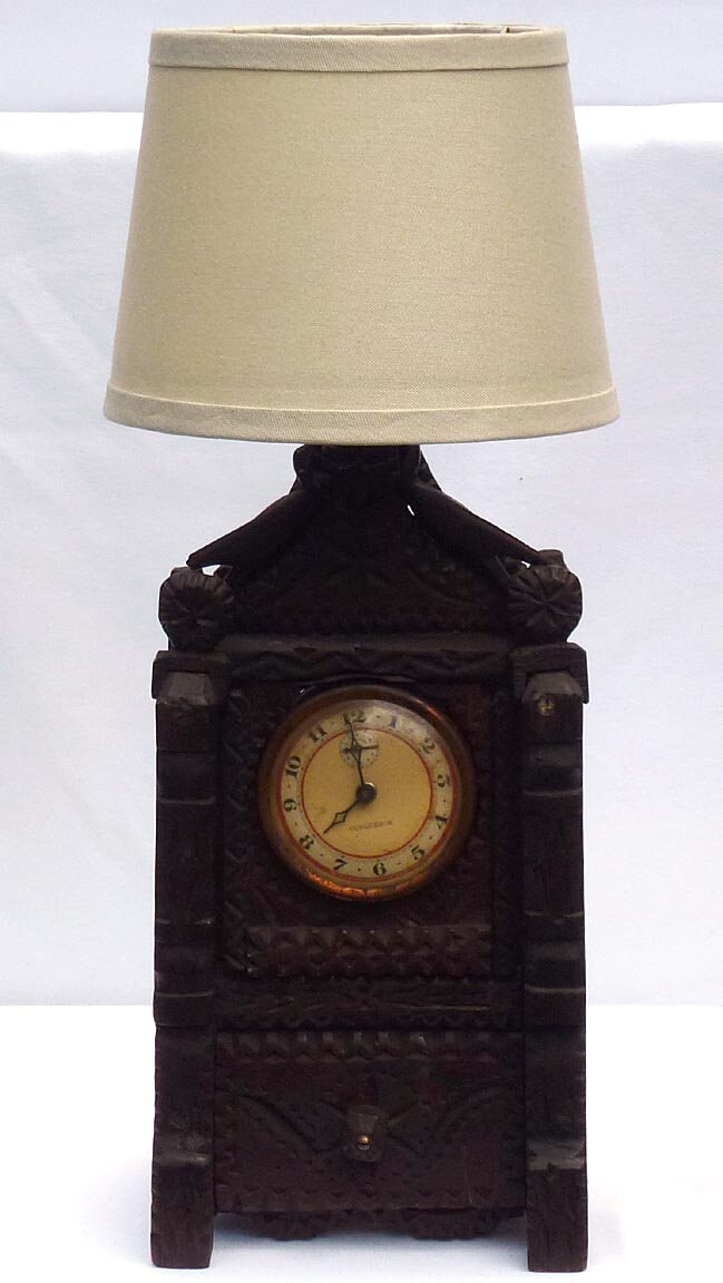 A Tramp Art Lamp With Clock and Drawer. Decorated With Carved Birds ...