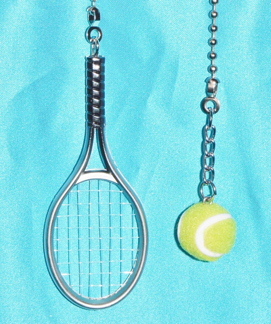 Pink Tennis Racket And Ball