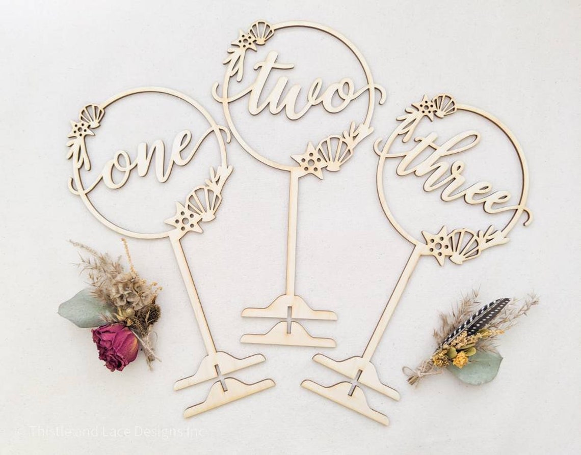 Beach-themed wedding table numbers Tropical centerpieces | Etsy