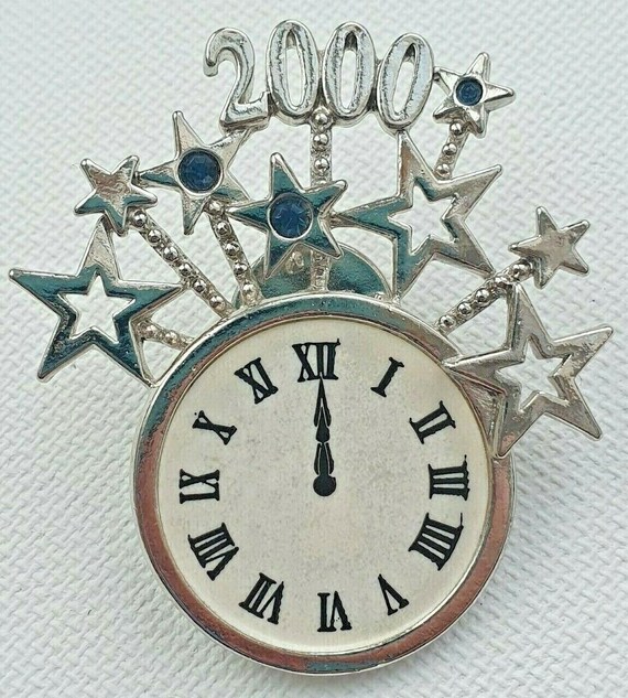 Avon MILLENNIUM CLOCK 2000 Silver-Tone Stars Lapel Pi… - Gem
