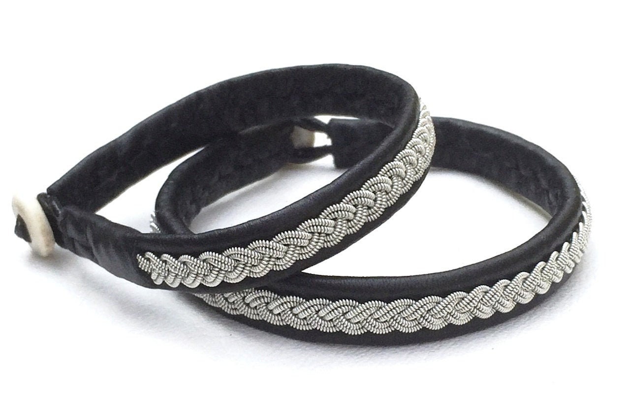 Traditional Scandinavian Sami reindeer leather bracelets, with a pewter ...