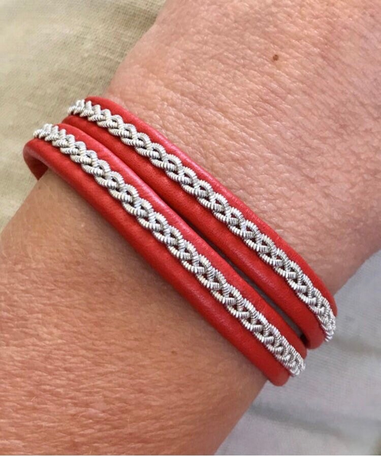 Traditional Sami double reindeer leather bracelets, with a braid of ...